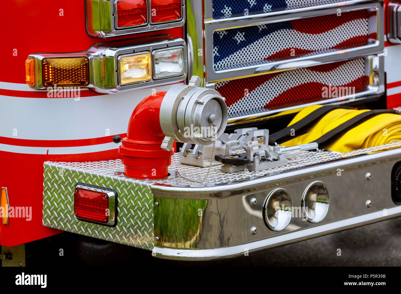 Part of the interior of a modern fire engine showing tools and ...