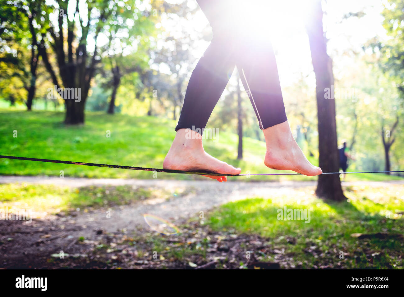 middle section human feet slacklining - balance, sport, tightrope ...