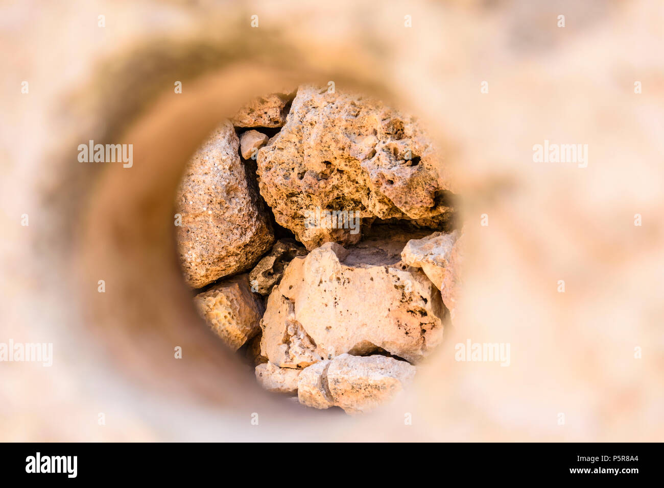 Round hole through one of the stones at the ancient megalithic temple ...