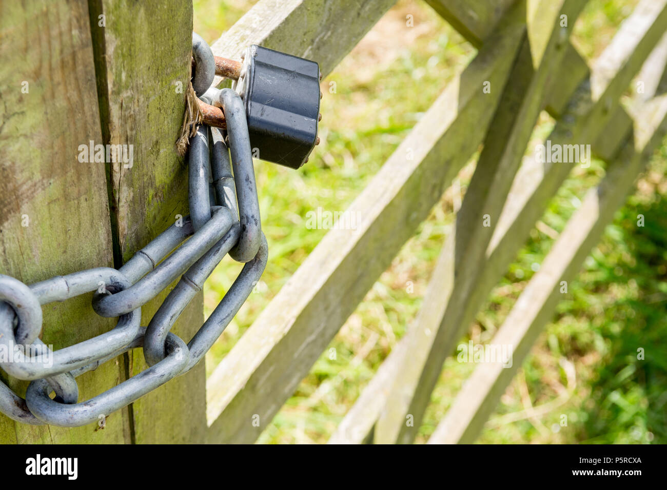 Padlocked gate field hi-res stock photography and images - Alamy