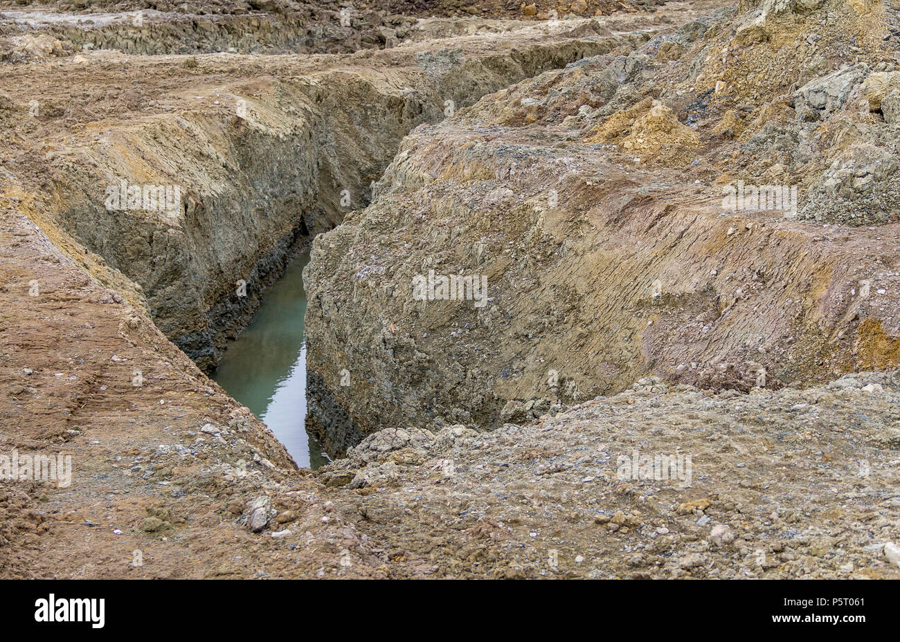 big ditch in a soil structure filled with water Stock Photo - Alamy