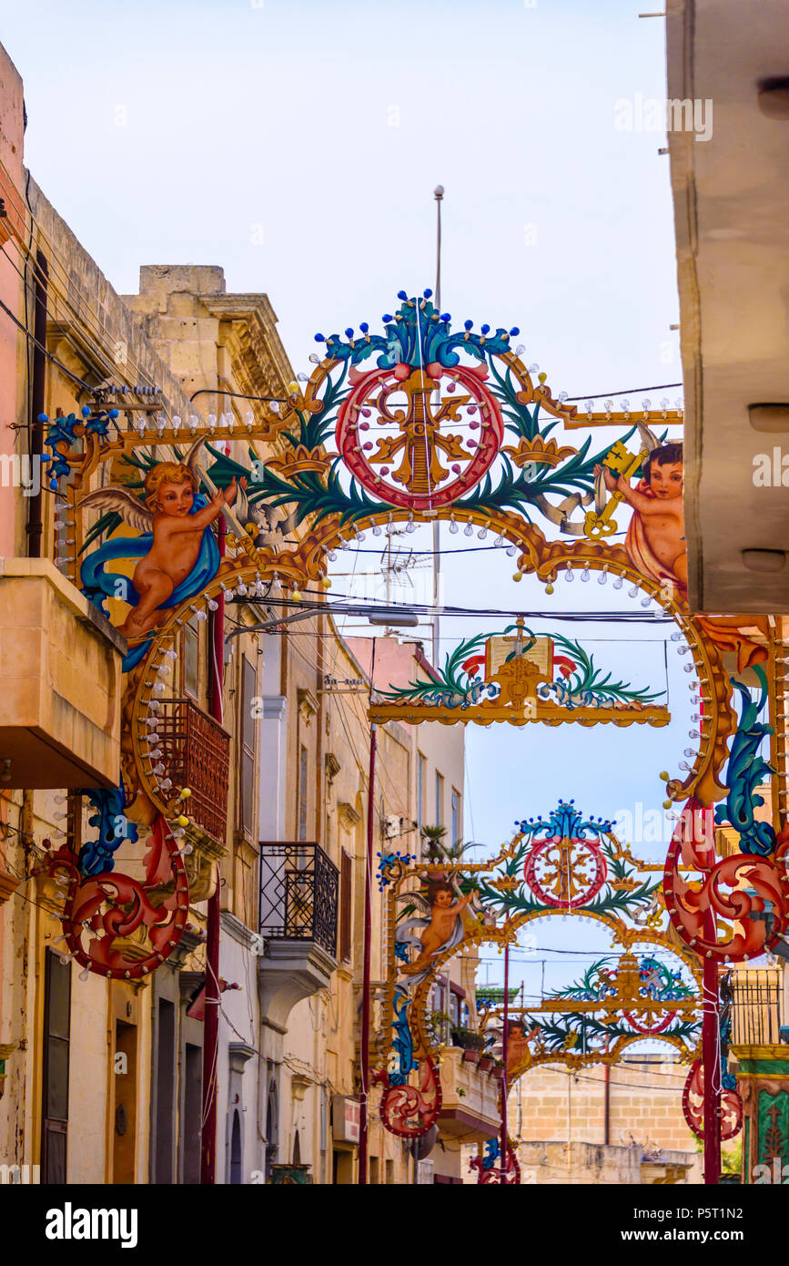Colourful decorative arches are erected for the festival of Saint Peter ...