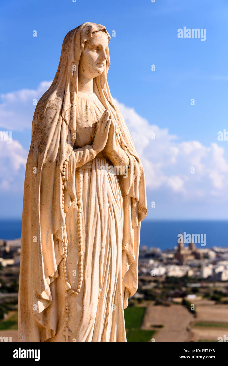 Statue of mary in a grotto hi-res stock photography and images - Alamy