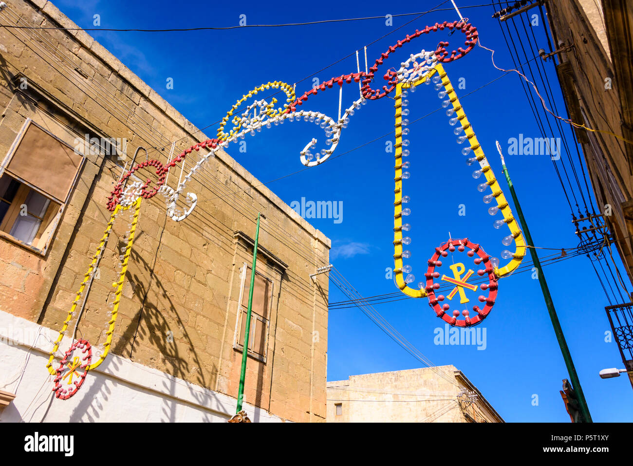 Colourful decorative arches, with the upside down cross of Saint Peter ...