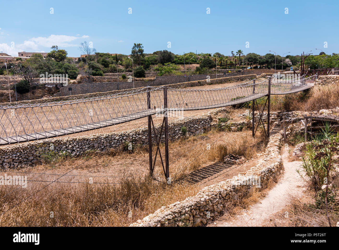 Rope bridge with wooden slats in the Judean replica village of ...