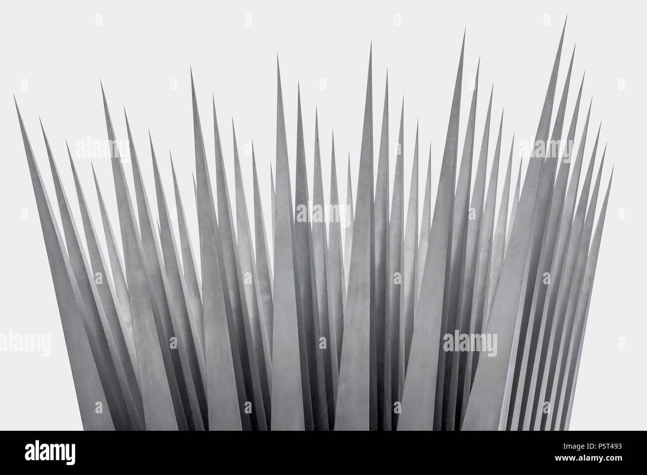 lots of metallic spikes in light back Stock Photo - Alamy