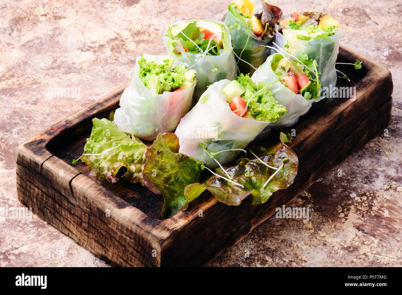 Assorted Asian spring rolls with vegetable and lettuce Stock Photo - Alamy