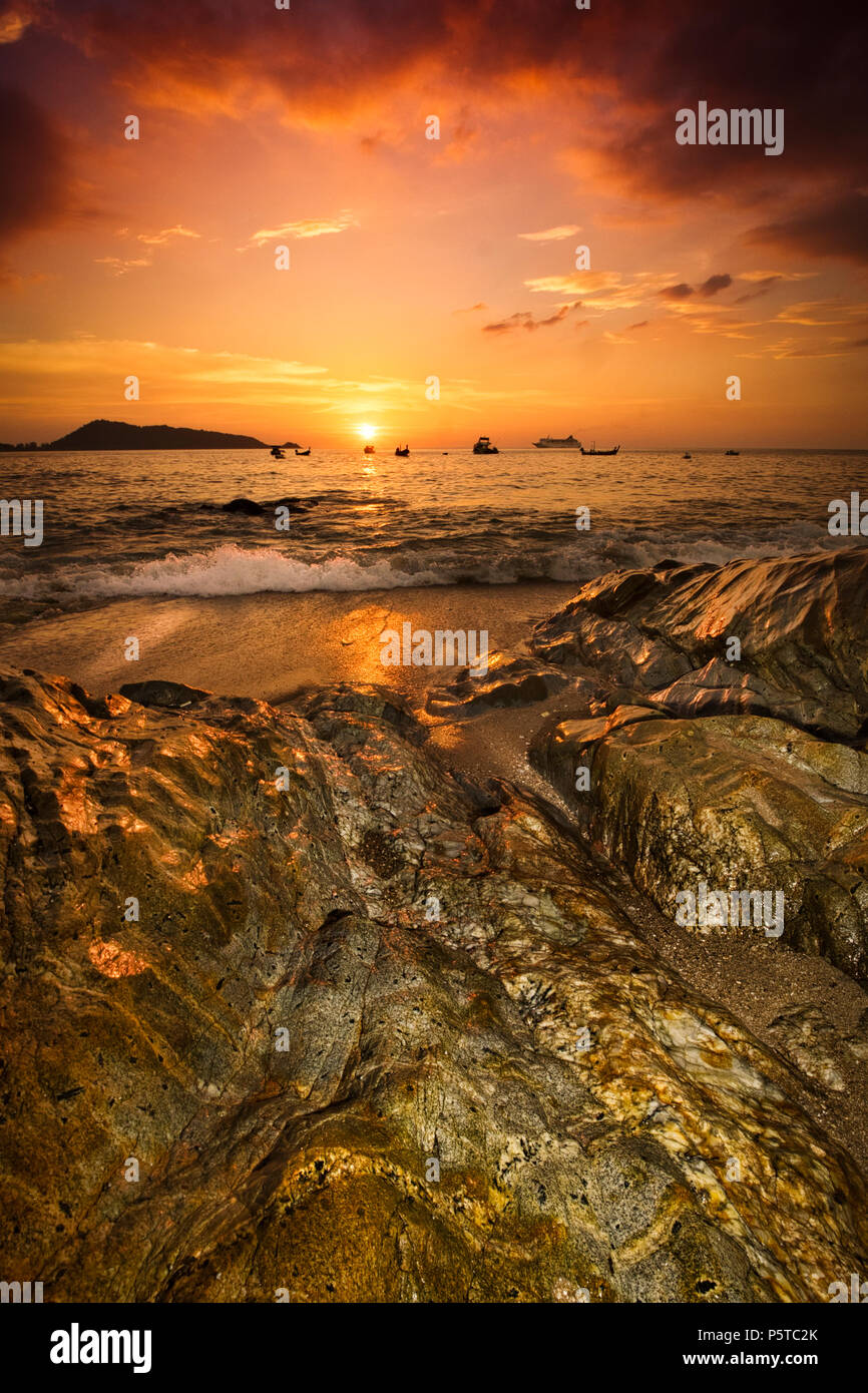 Sunset on the beach in Thailand Stock Photo - Alamy