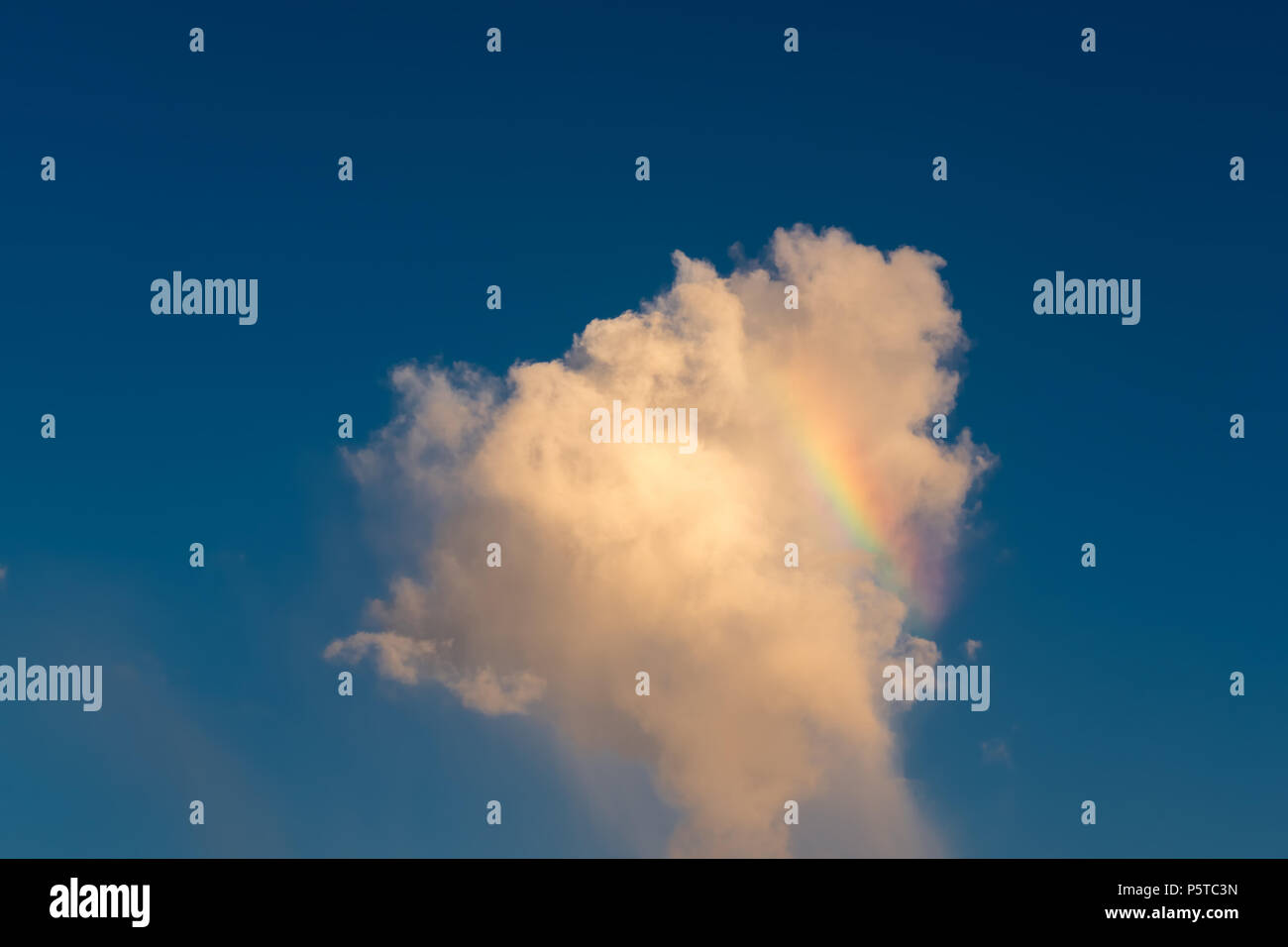 Horizontal rainbow in a cloud Stock Photo - Alamy