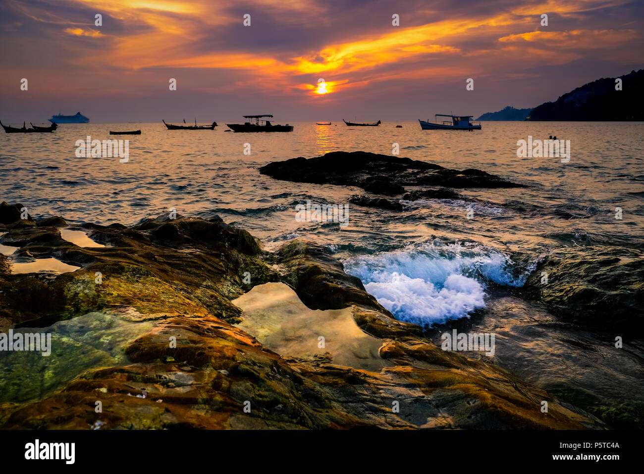 Sunset on the beach in Thailand Stock Photo - Alamy