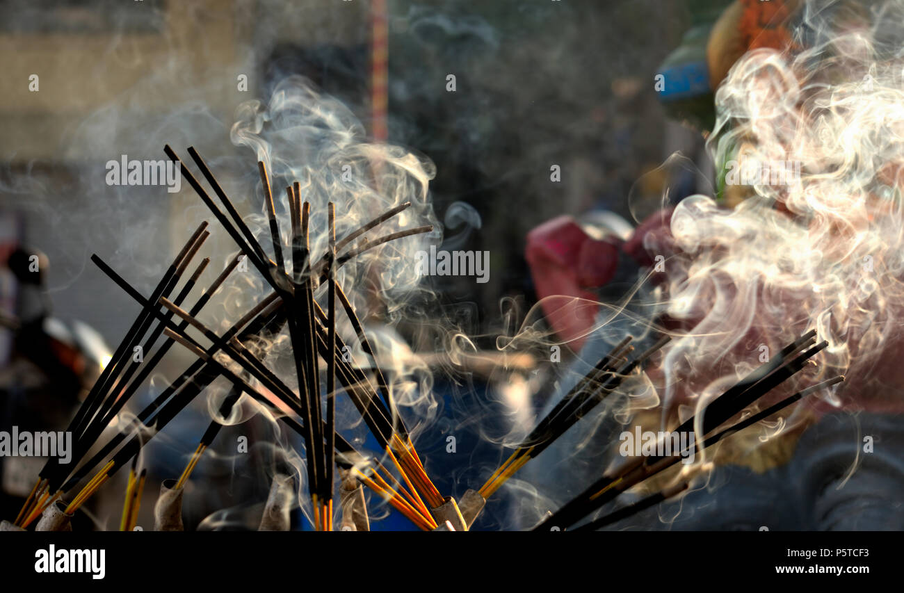 Smoke of Incense Sticks Stock Photo - Alamy