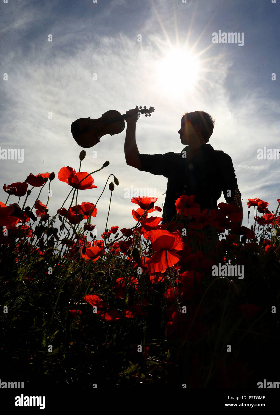 Musician and composer Thoren Ferguson with the Wilfred Owen violin in a ...