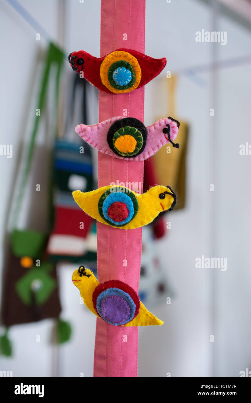 Artificial bird made out of colored handicrafts elements Stock Photo ...