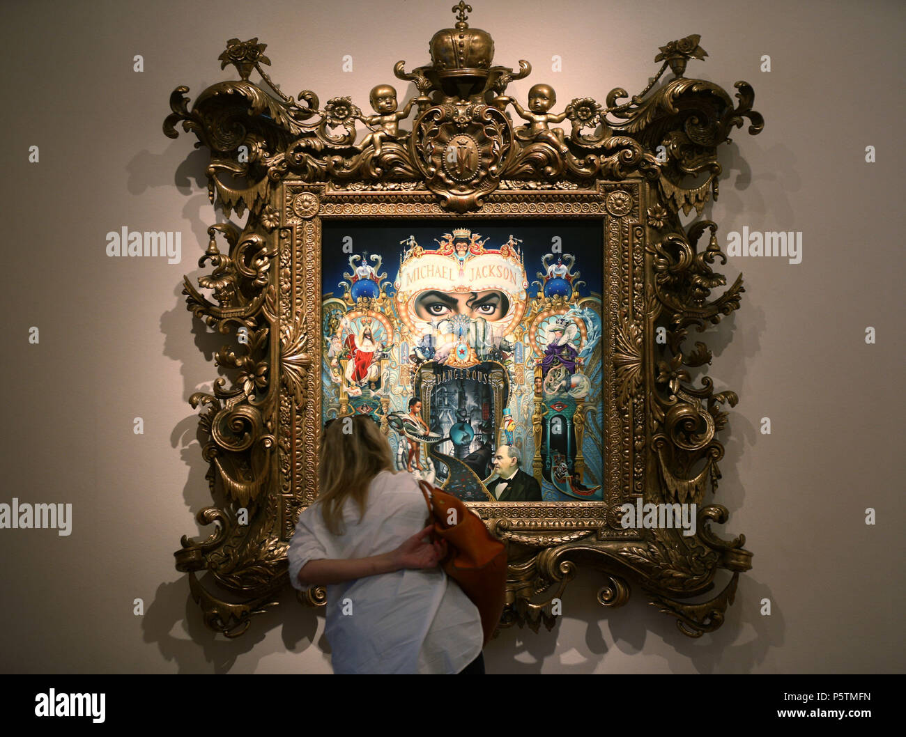 A visitor looking at Mark Ryden's "The King of Pop" (#135), 1991-2018 ...