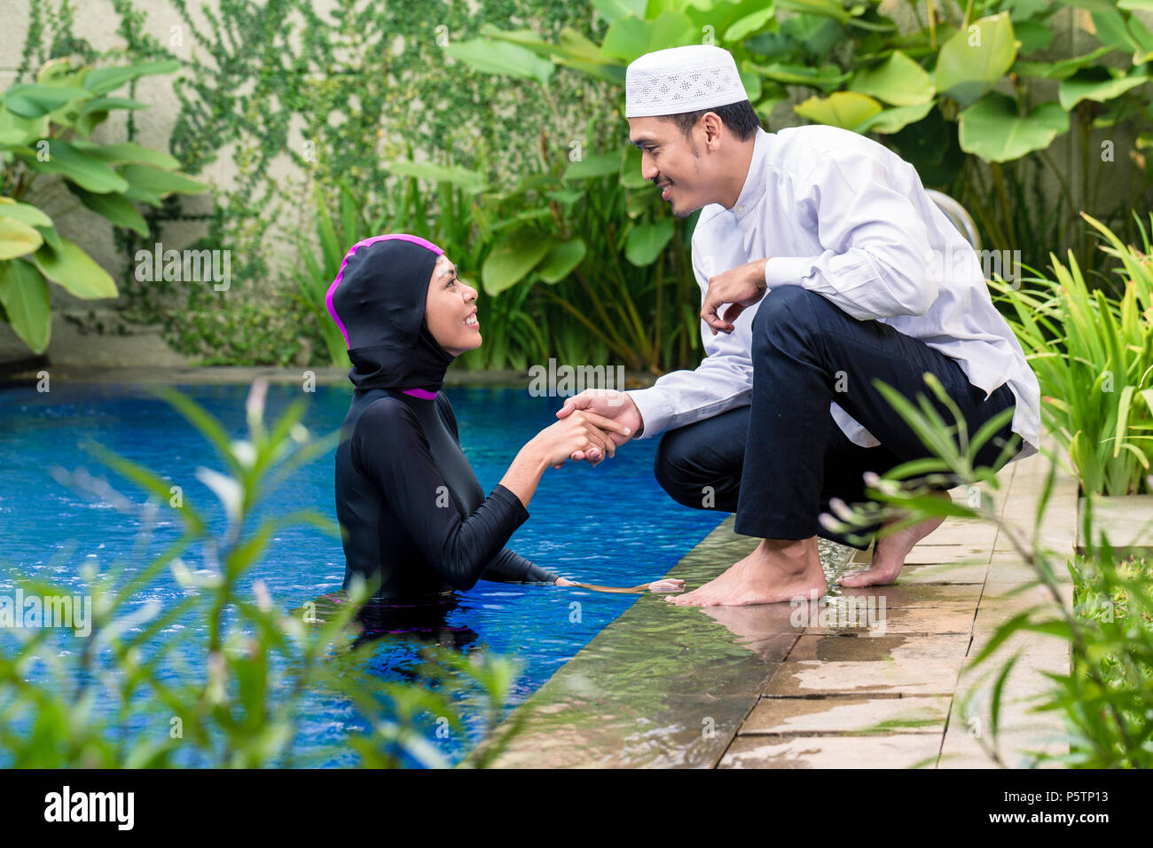 Muslim Swimming High Resolution Stock Photography and Images - Alamy