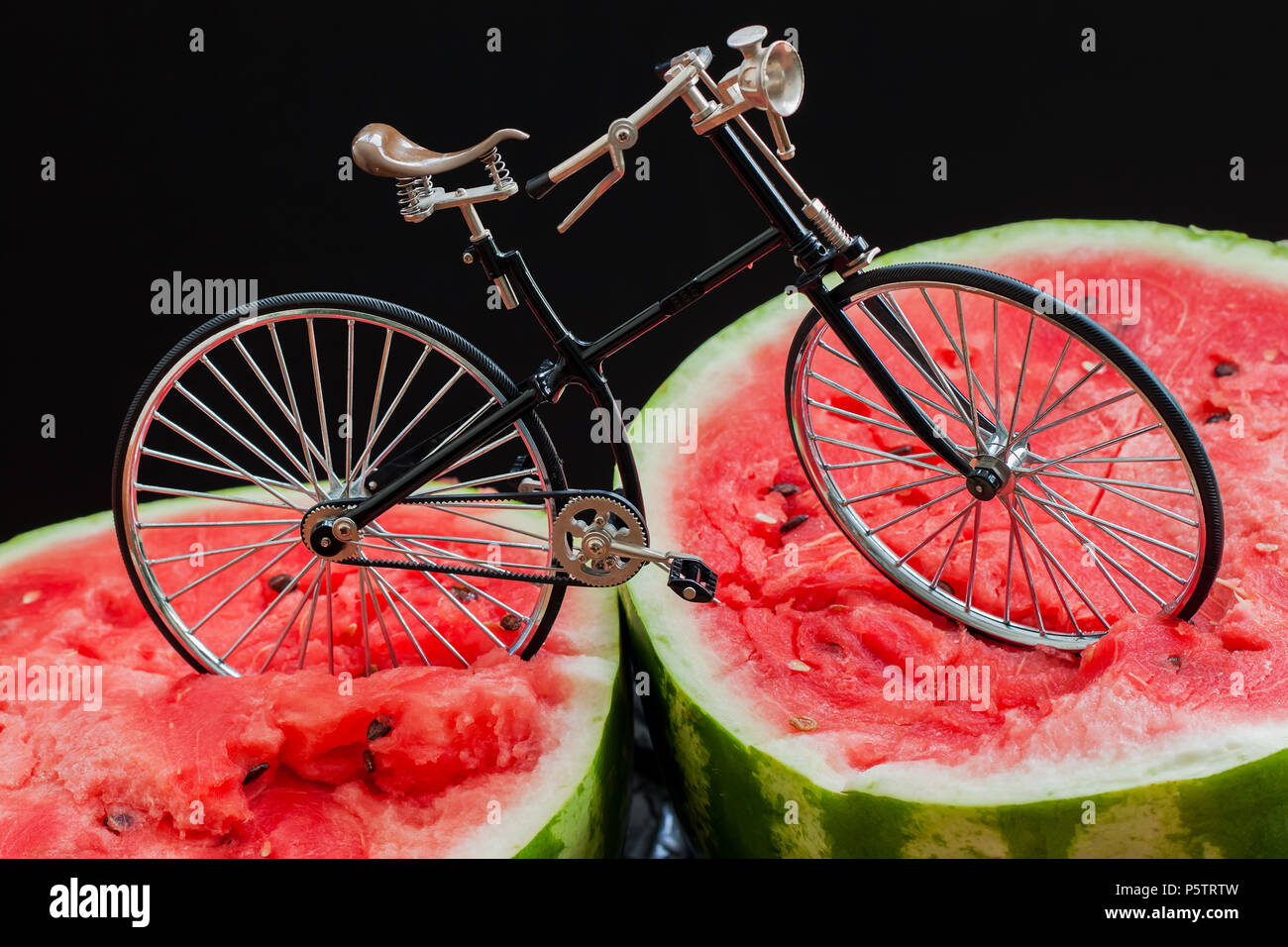 Watermelon on bike hi-res stock photography and images - Alamy
