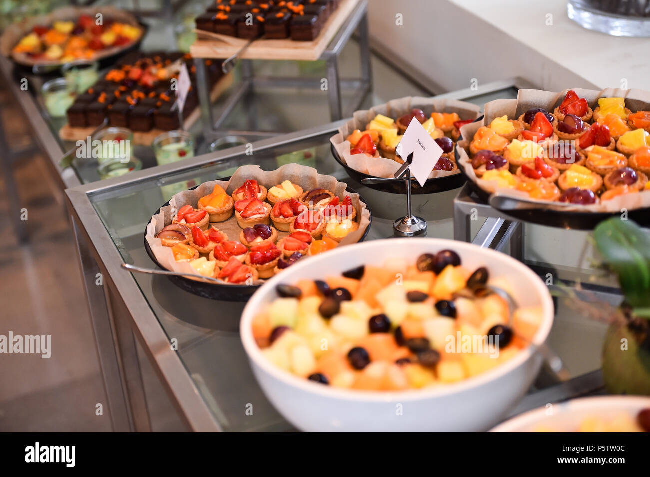Catering service with delicious deserts and fruit tarts Stock Photo - Alamy