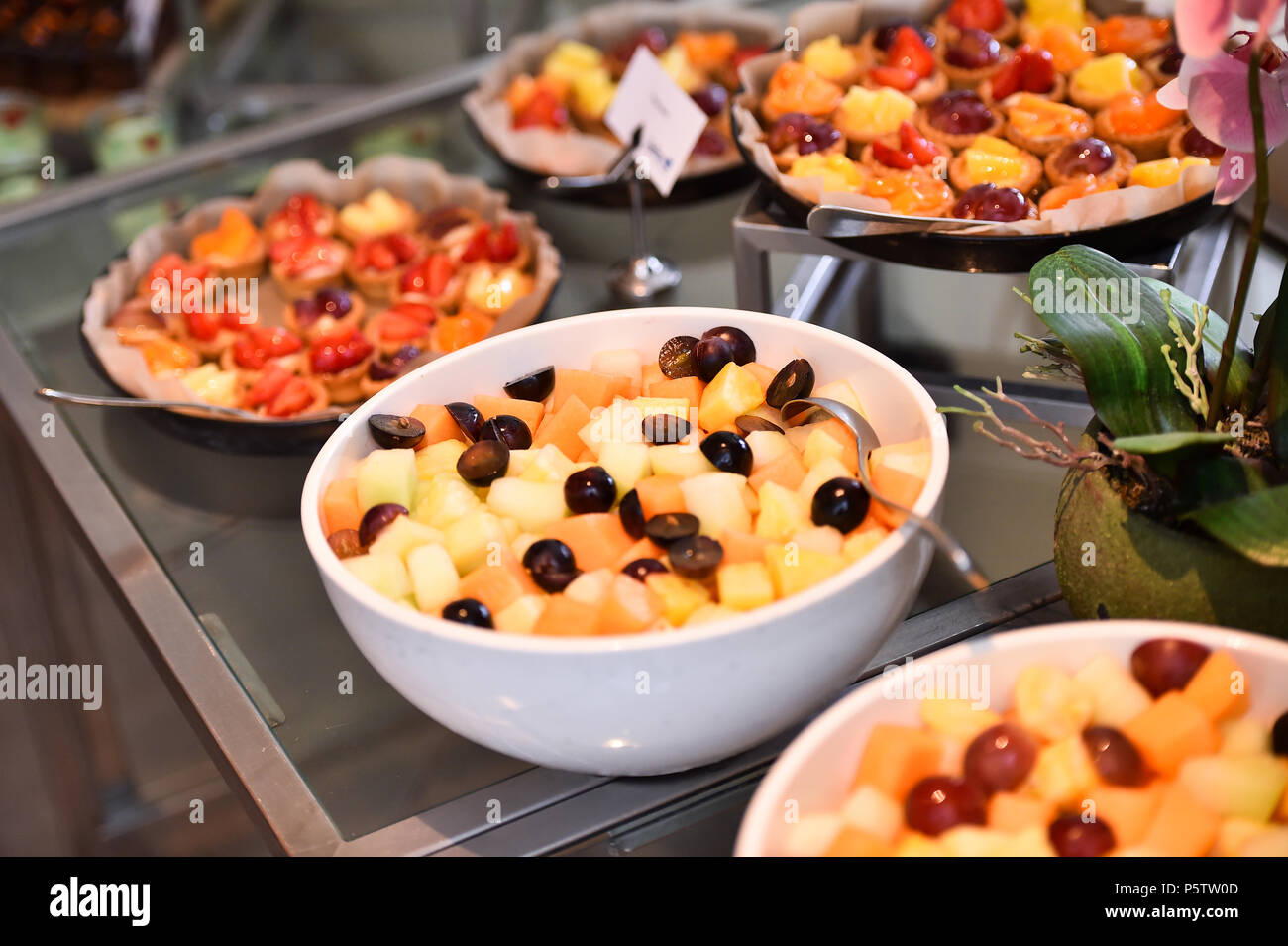 Catering service with delicious deserts and fruit tarts Stock Photo - Alamy