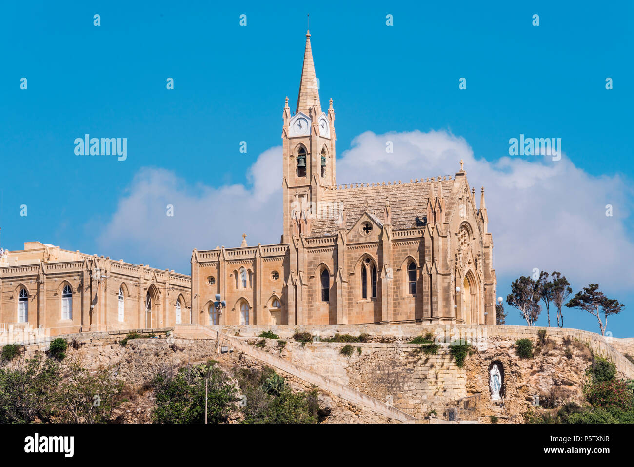 Mgarr Parish Church sitting on a hill above Mgarr town, the first thing ...