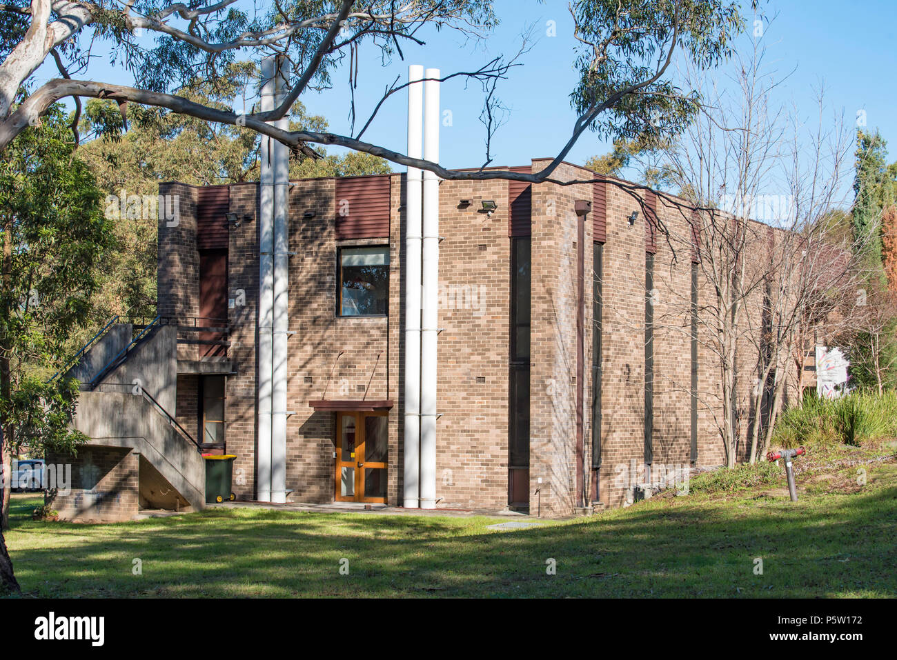 A late 1960s or early 70's modernist Brutalist, brick office building ...