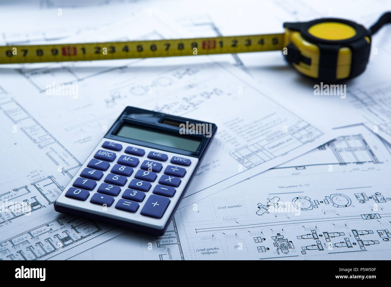 Measuring tape calculator paper hi-res stock photography and images - Alamy