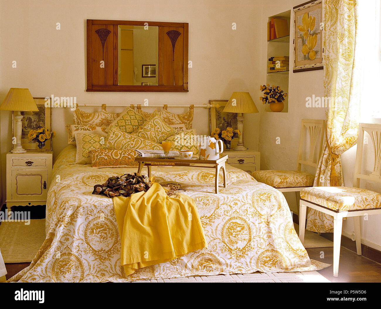 Patterned cushions in yellow hi-res stock photography and images - Alamy