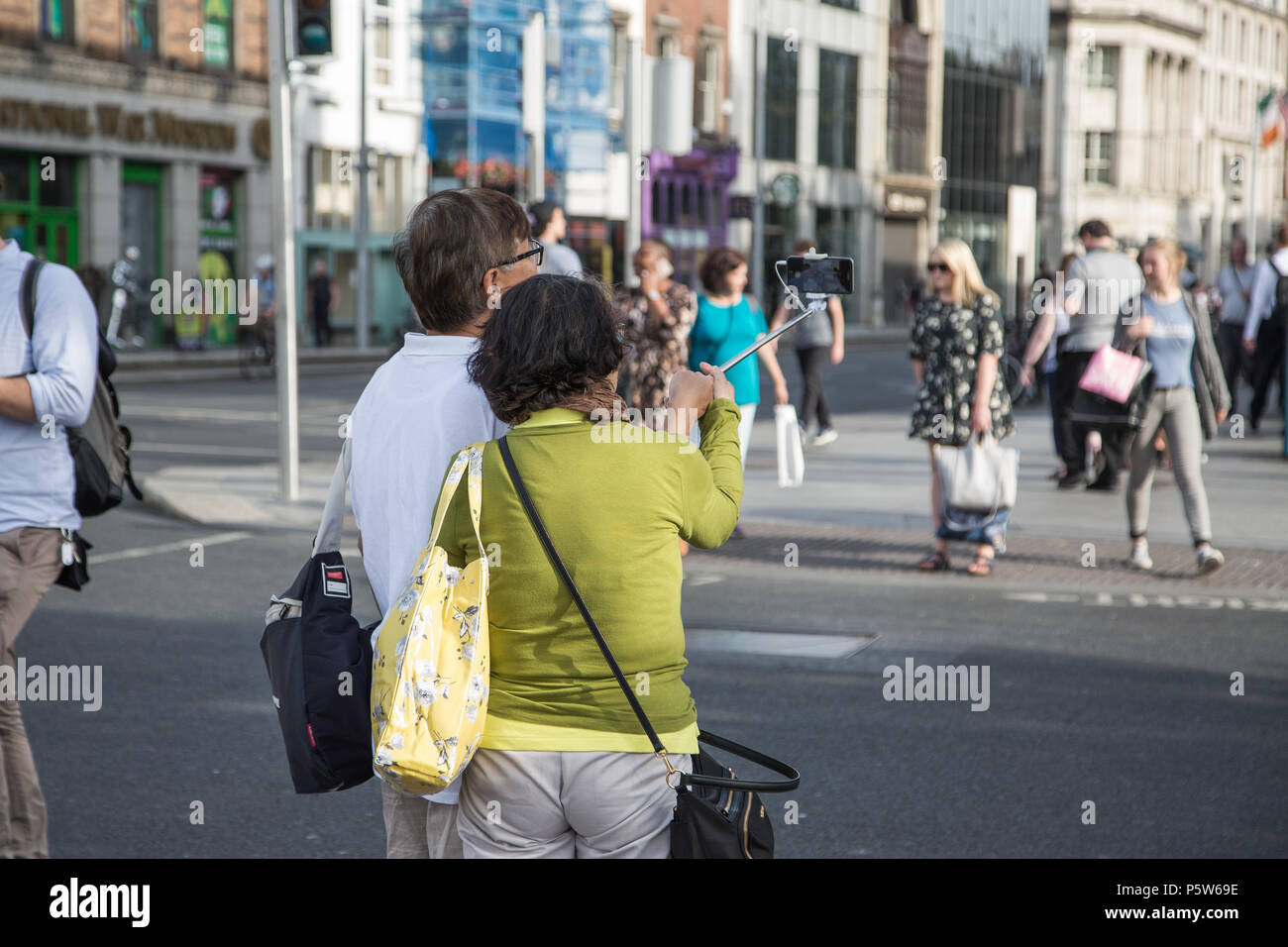 Using a stick hi-res stock photography and images - Alamy