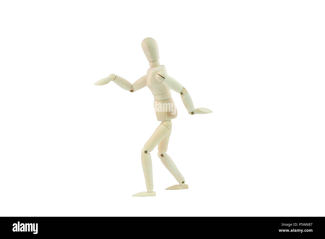 Articulated wooden dummy dancing isolated on white background Stock ...