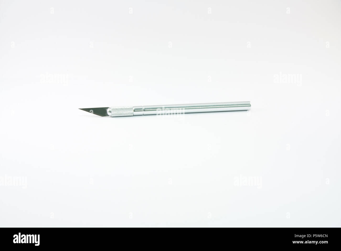 metal cutter isolated on white background Stock Photo - Alamy