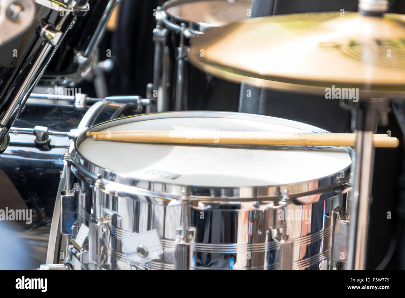 musical instruments in a band playing in the street Stock Photo - Alamy