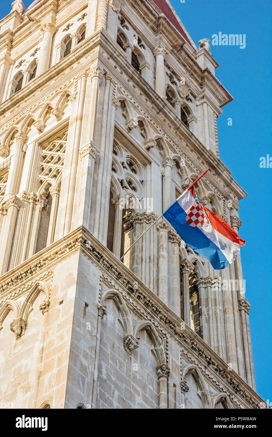 Detail of Cathedral of St. Lawrence with croatian flag in Trogir ...