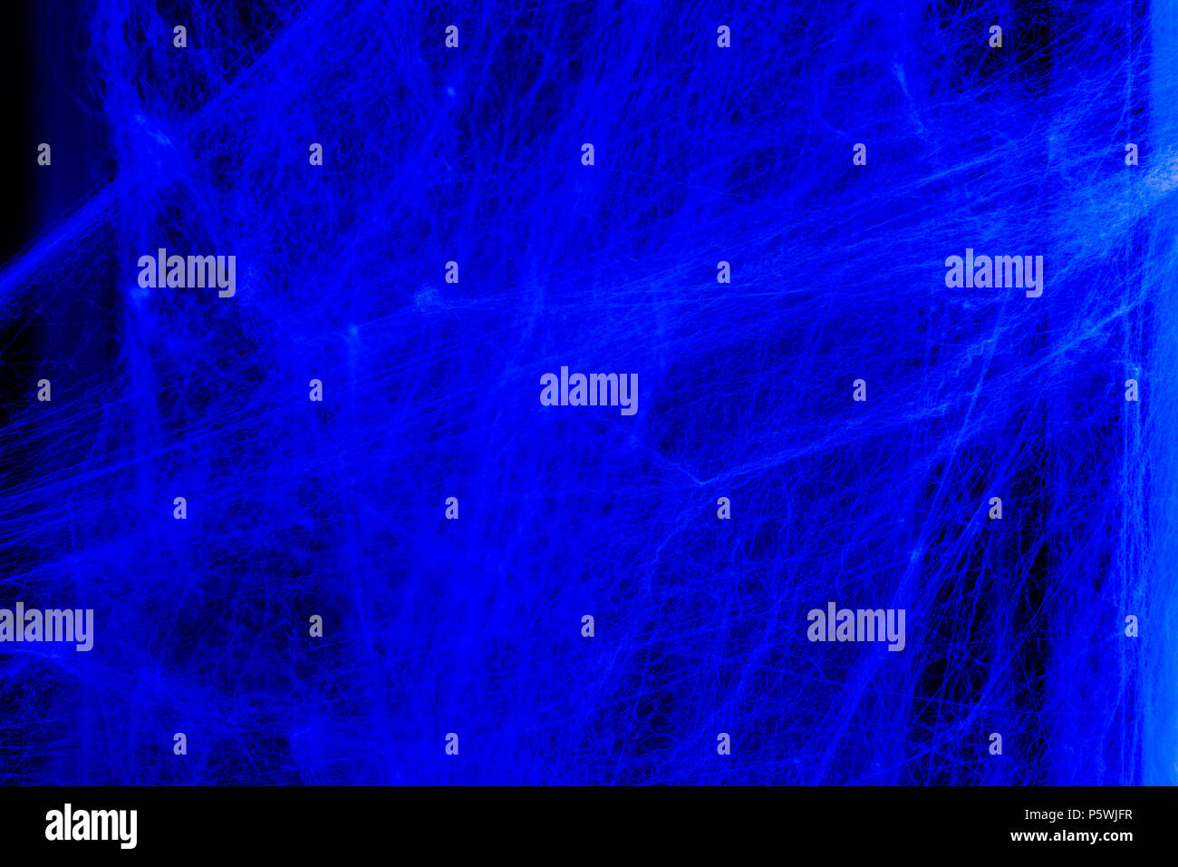 Blue Spider web halloween background Stock Photo - Alamy