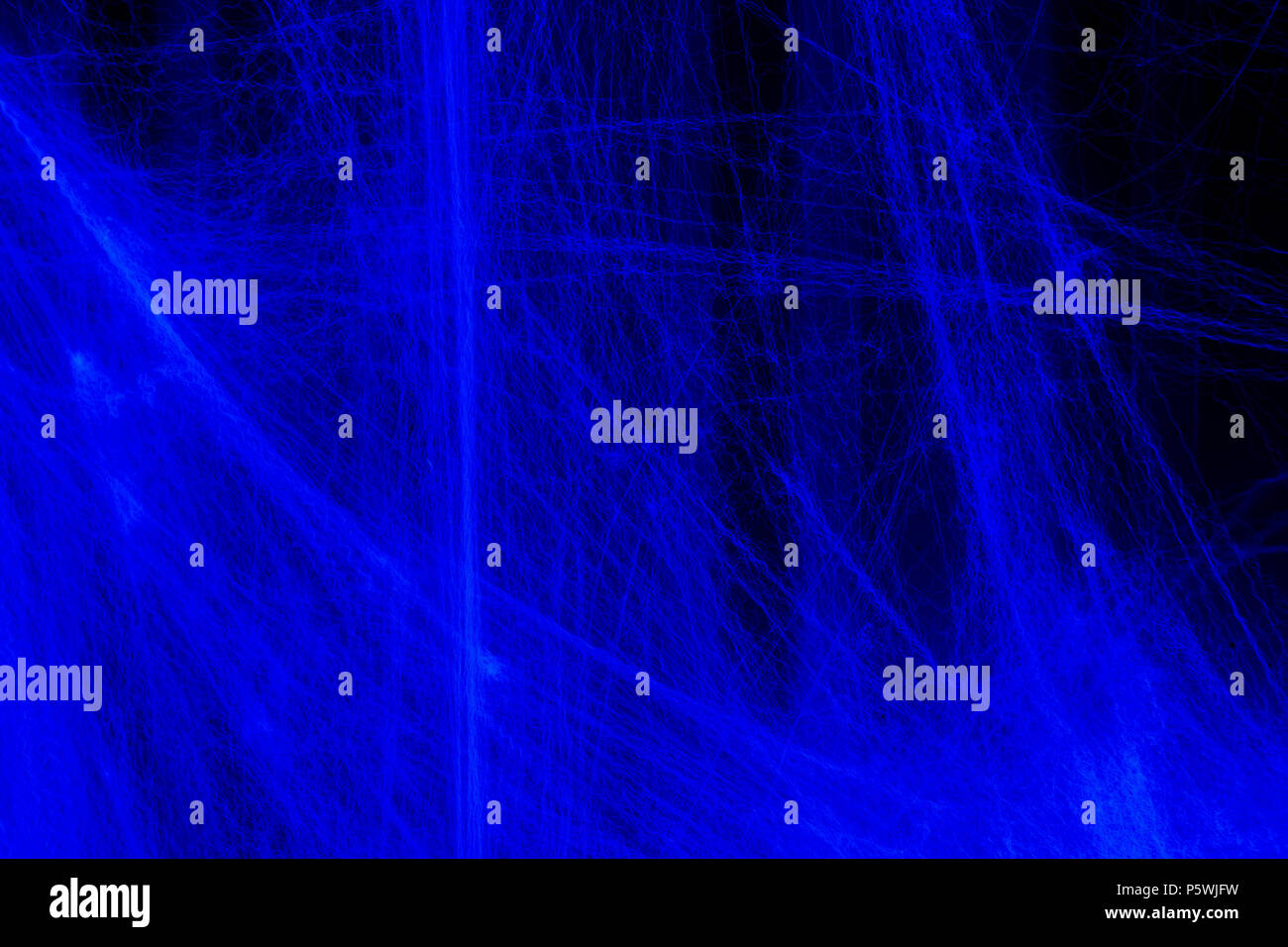 Abstract Blue Spider web halloween background Stock Photo - Alamy