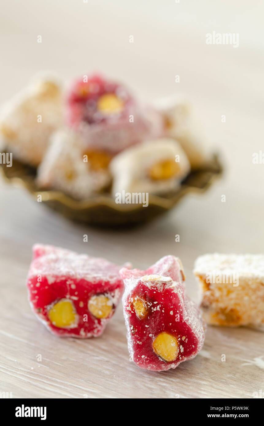 Turkish delight with pistachio nuts in traditional carved patterned ...