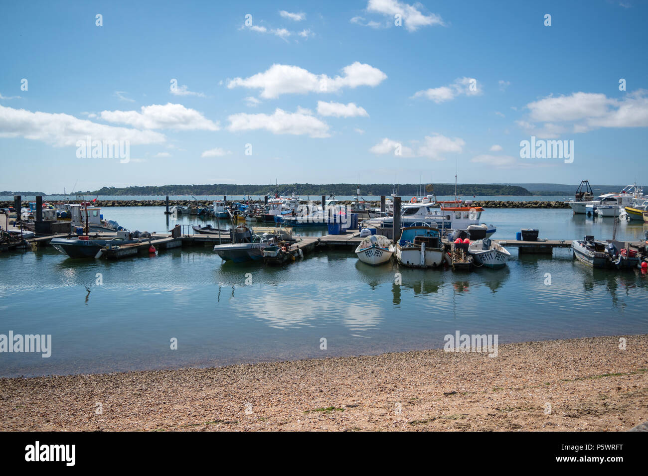 Fishing boats poole harbour hi-res stock photography and images - Alamy