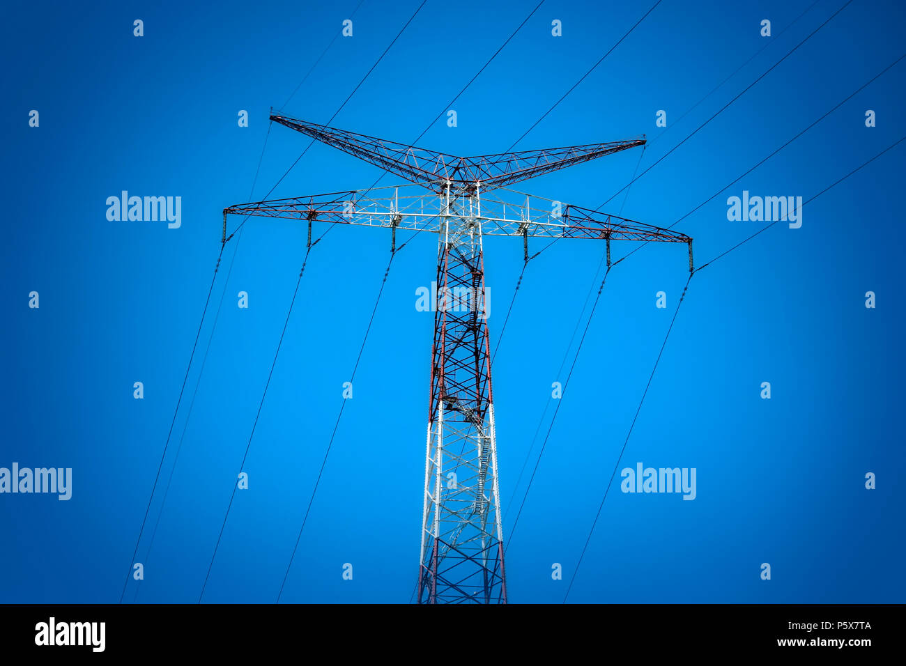 an image of a metal tower of Power Lines Stock Photo - Alamy