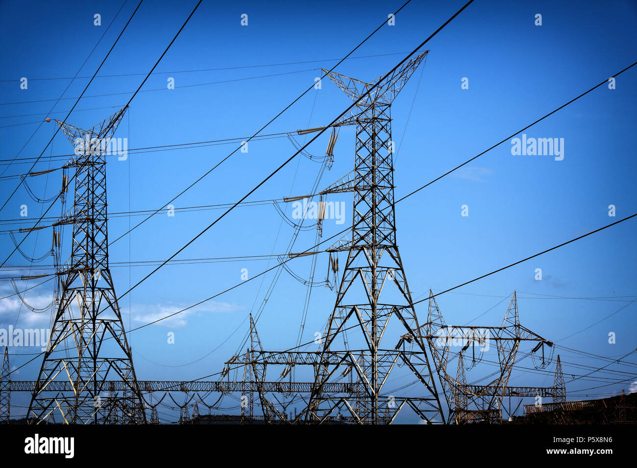 an image of a metal tower of Power Lines Stock Photo - Alamy