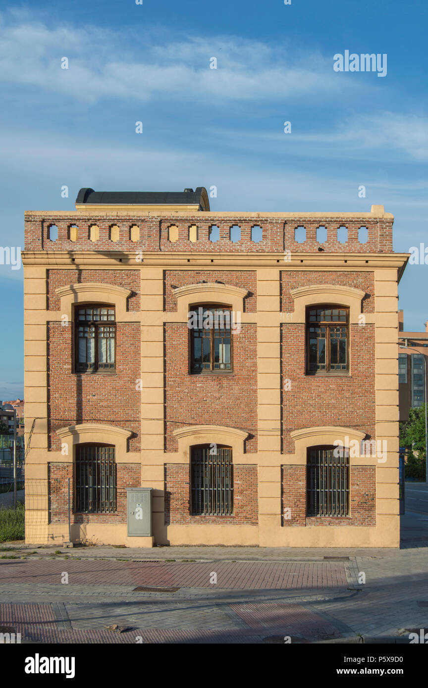 Exterior lateral facade of brick house and rooftop with framed windows ...