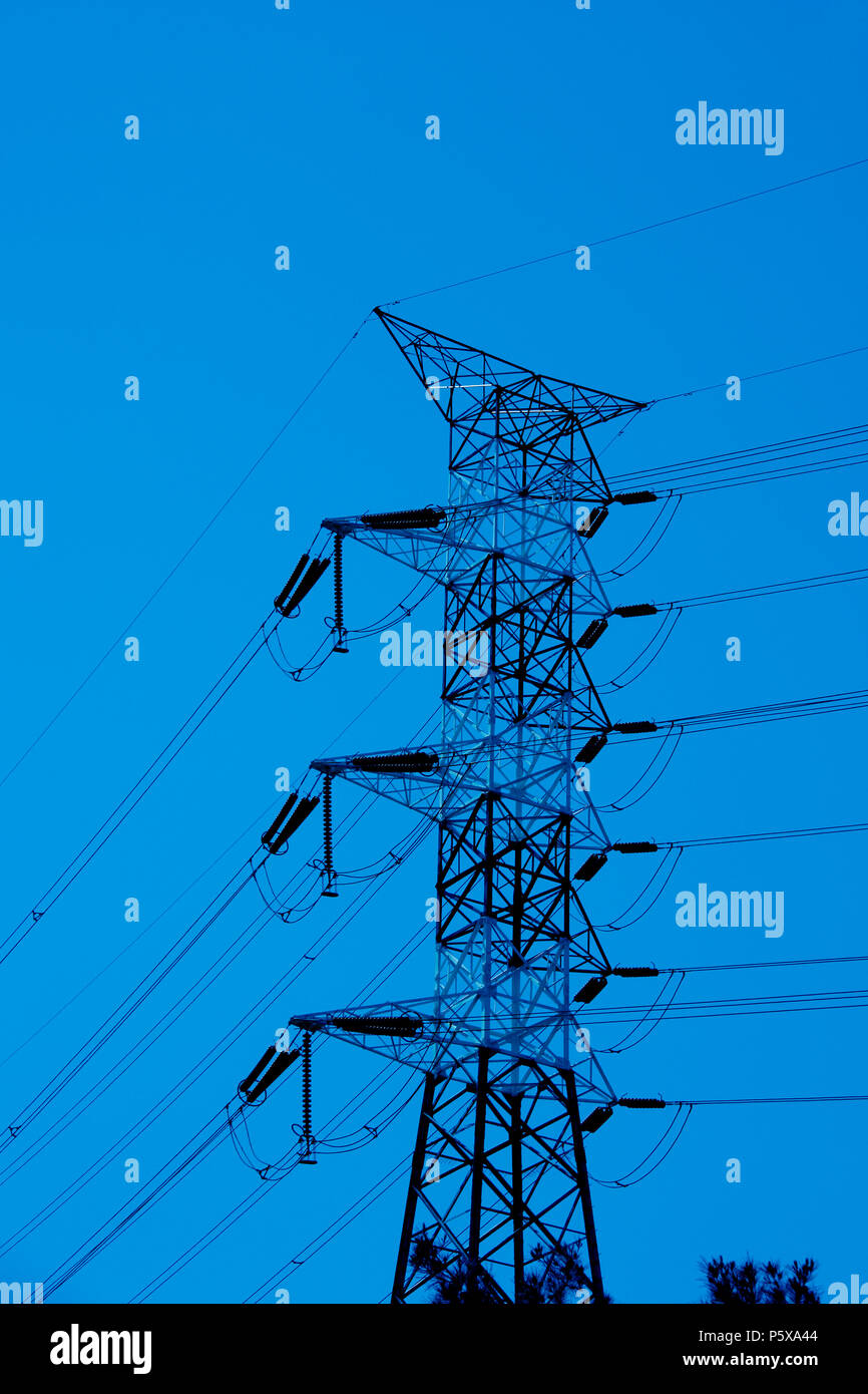 an image of a metal tower of Power Lines Stock Photo - Alamy