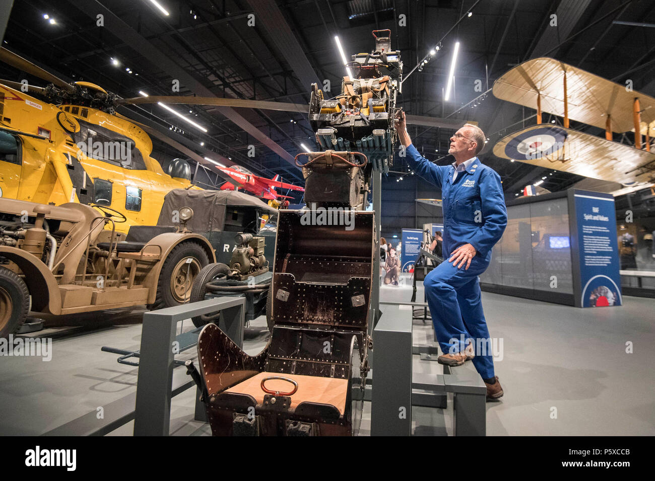 A volunteer looks at a Martin Baker Ejector Seat used in the 1970s in a ...
