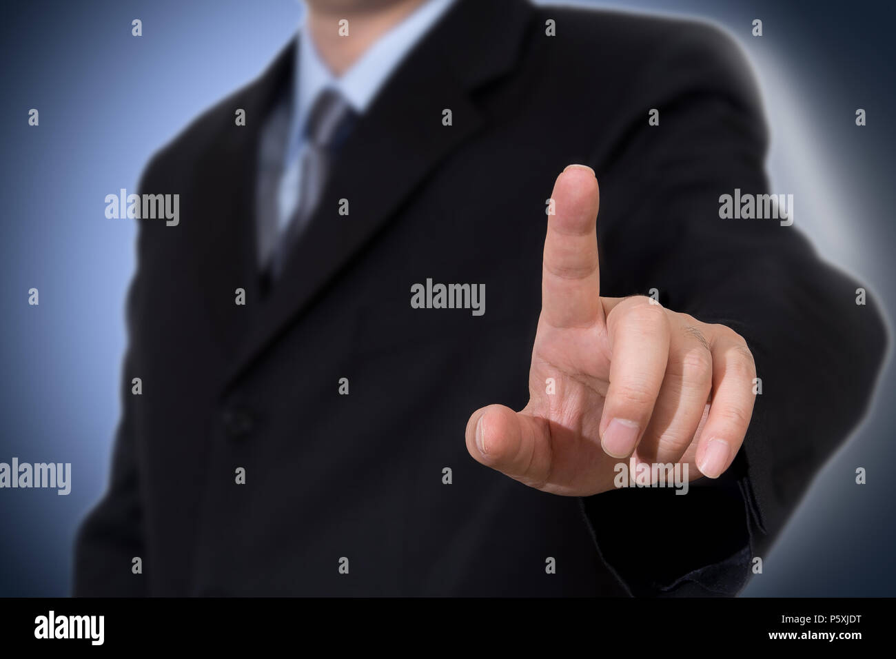 Business man touching imaginary screen Stock Photo - Alamy