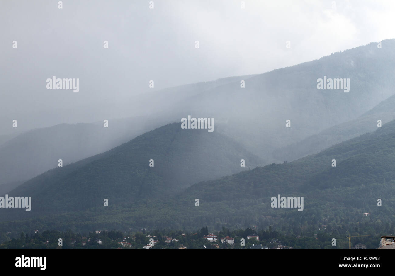 Heavy rain and a storm with damages on the Balkans, Europe. Rain, storm ...