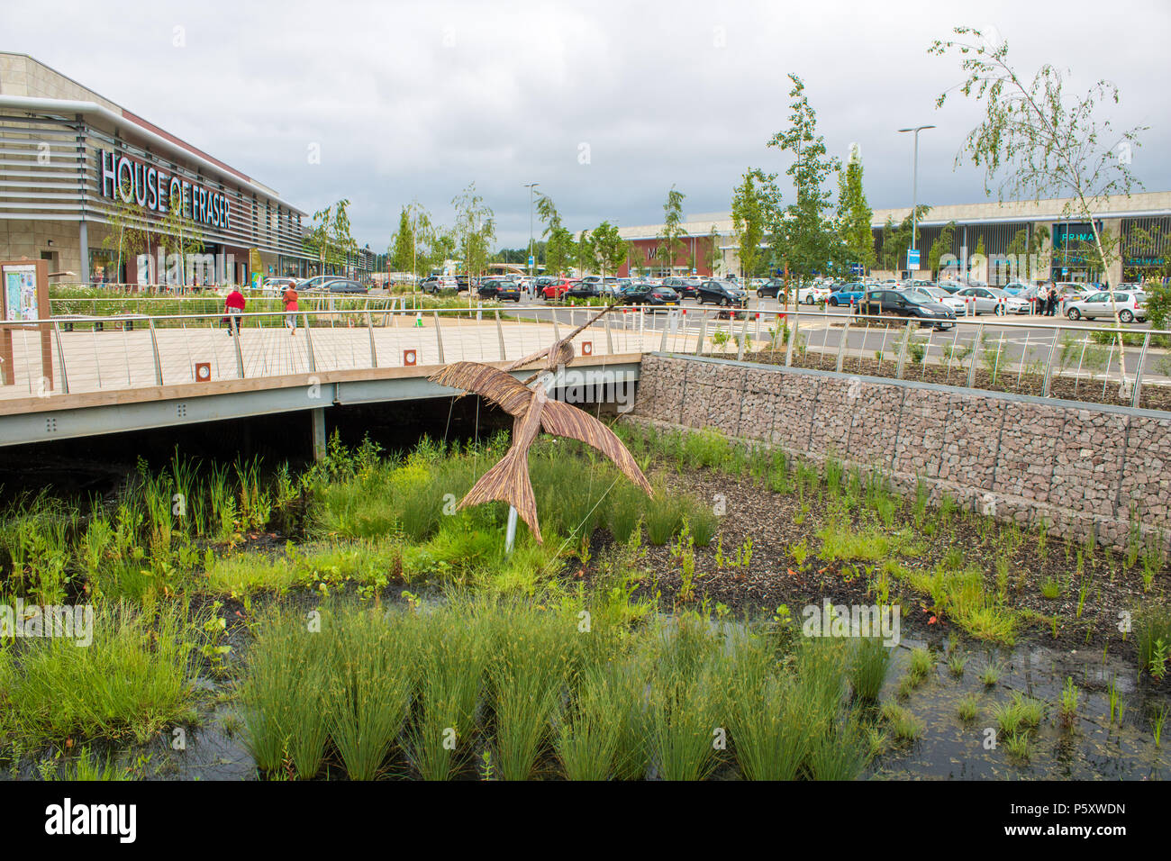 Bird Sculpture, House of Fraser and Car Park at Rushden Lakes Shopping ...