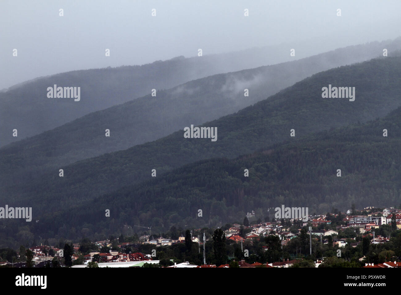 Heavy rain and a storm with damages on the Balkans, Europe. Rain, storm ...