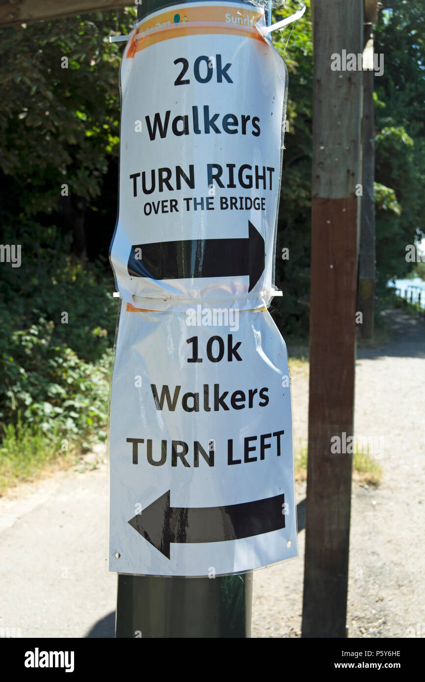 temporary signs at teddington lock bridge giving directions for walkers ...