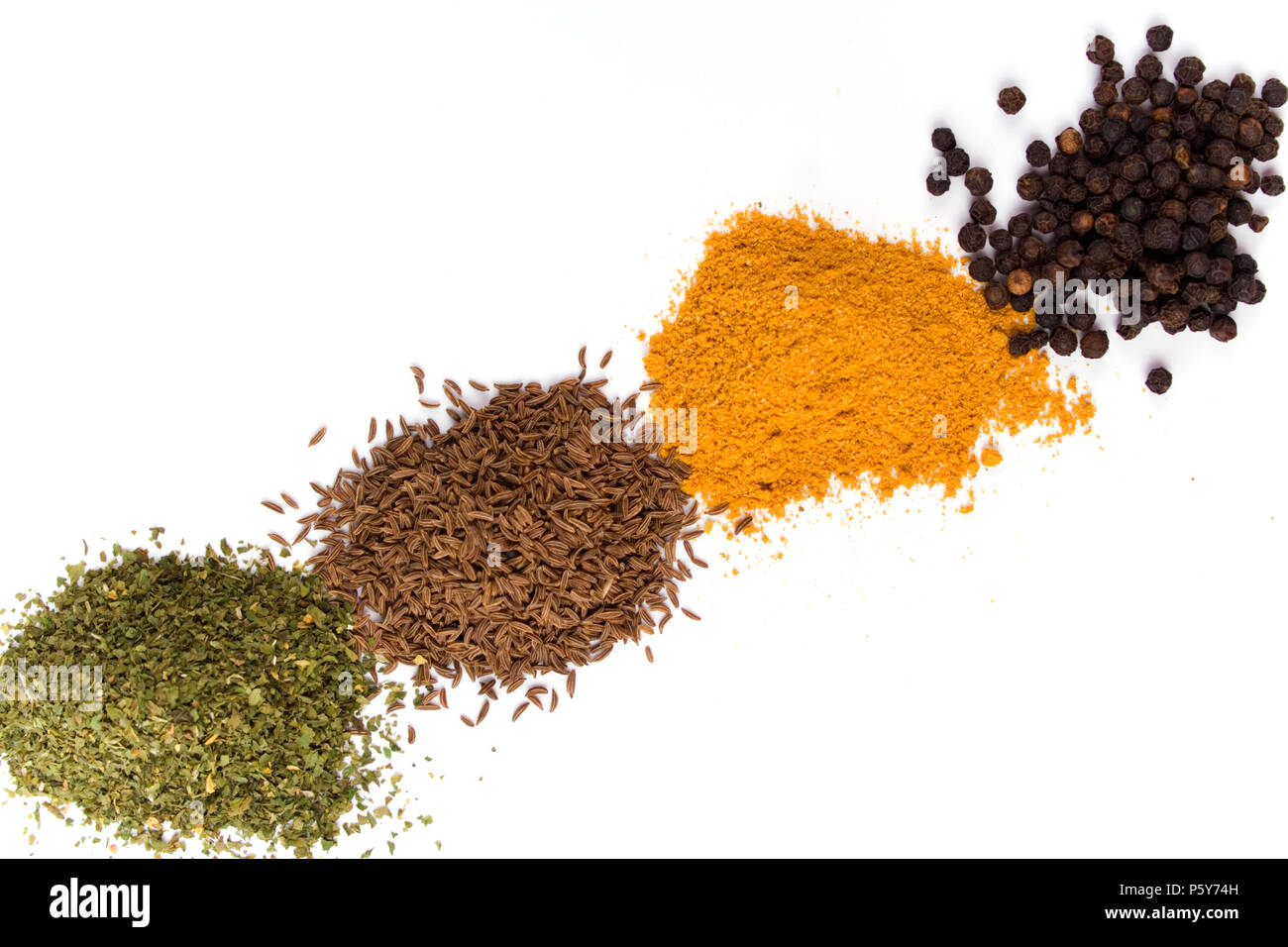 haps of various spices on white background Stock Photo - Alamy