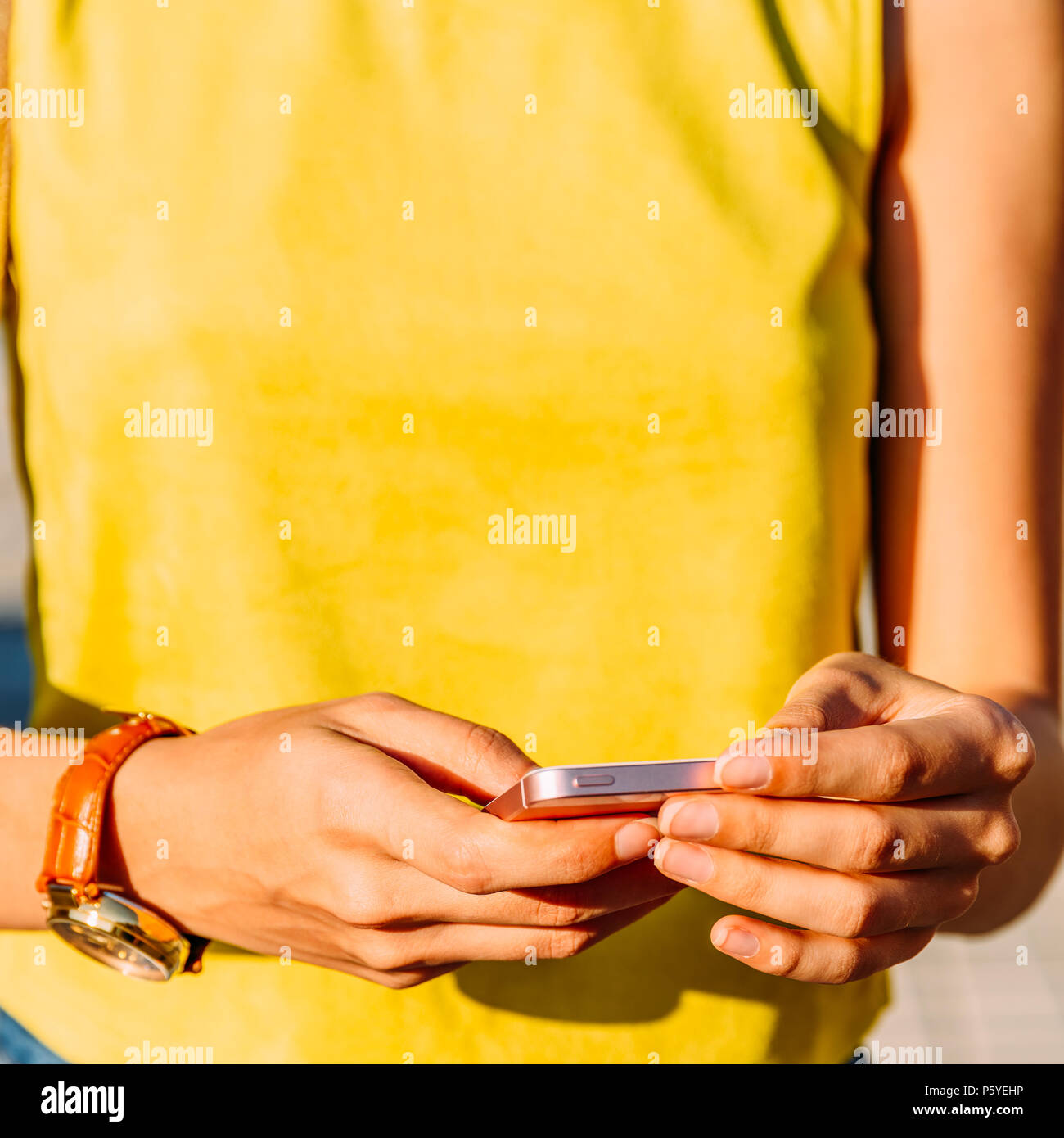 Young Woman Checking Her Mobile Phone Stock Photo - Alamy