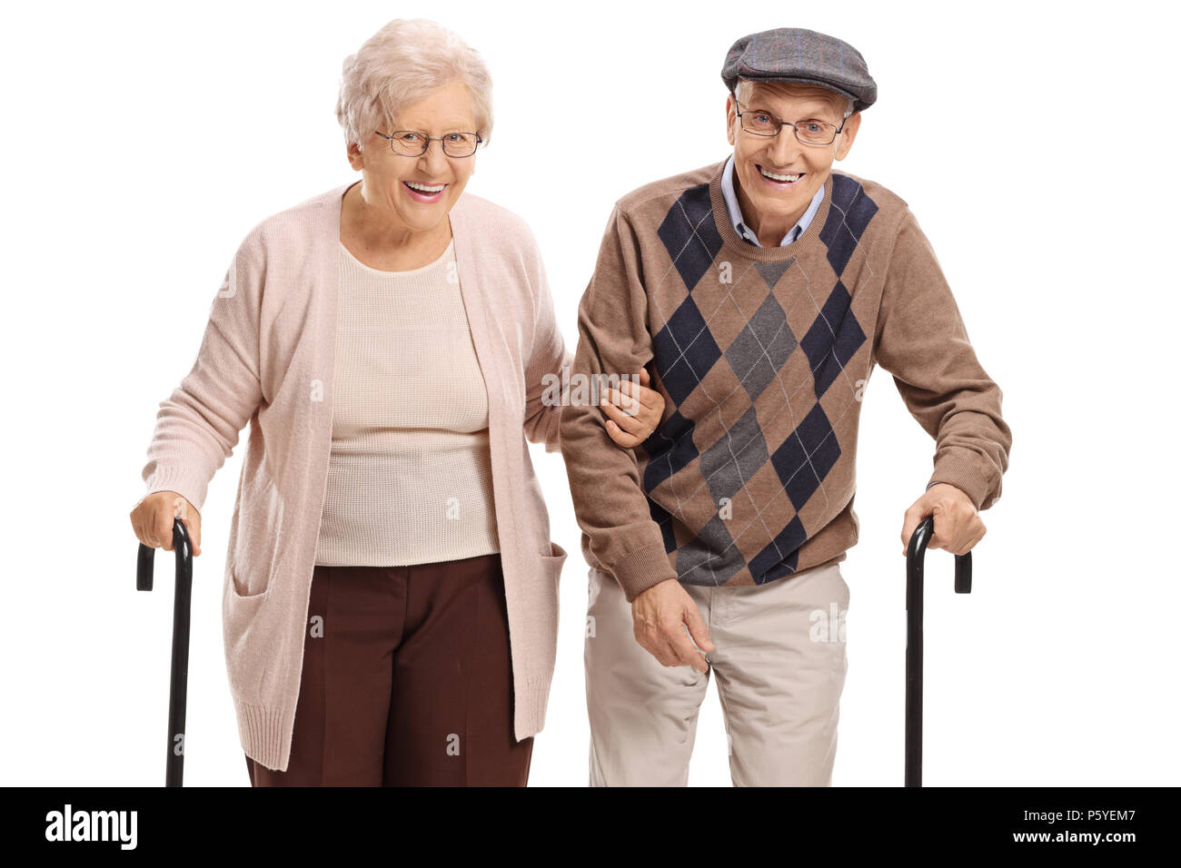 Two elderly people walking canes hi-res stock photography and images ...