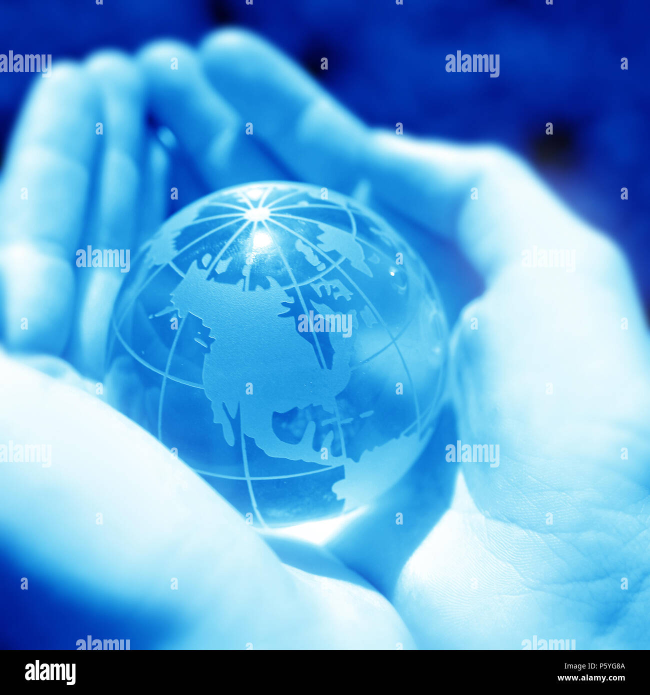 an image of glass globe in hand Stock Photo - Alamy