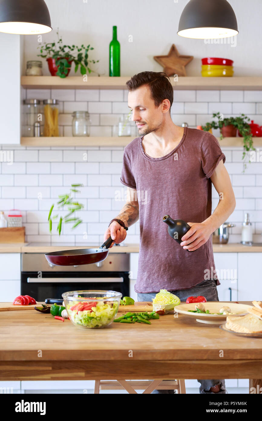 Hands person frying food on hi-res stock photography and images - Alamy
